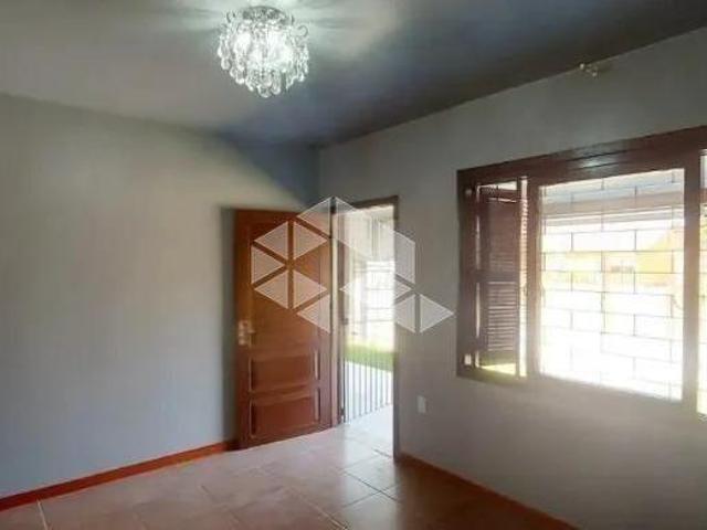 Casa Térrea, 4 Quartos, 1 suíte, 3 Banheiros, 4 vagas localizado no Bairro Harmonia em Canoas/RS