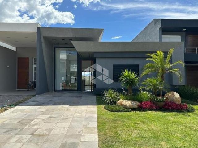 Casa térrea 4 suítes no condomínio Blue em Xangri lá/RS