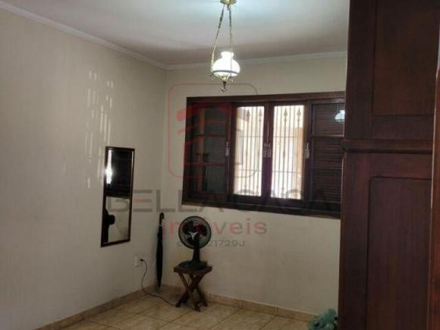 Casa Térrea 5 dormitórios 2 vagas salão comercial