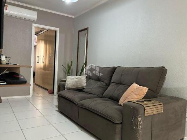 Casa térrea 02 dormitorios 01 suíte, vagas para 02 veiculos, área gourmet fechada, 2 vagas de carro