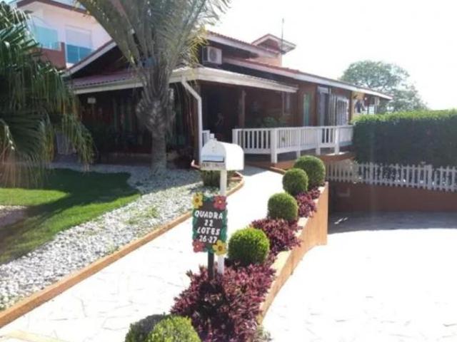 CASA TÉRREA 250m²/4 QUARTOS COM PISCINA À VENDA CONDOMÍNIO ARUÃ MOGI DAS CRUZES