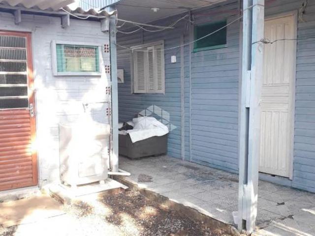 Casa térrea 2 dormitórios no Loteamento Urubatan Aberta dos Morros Zona Sul de POA/RS