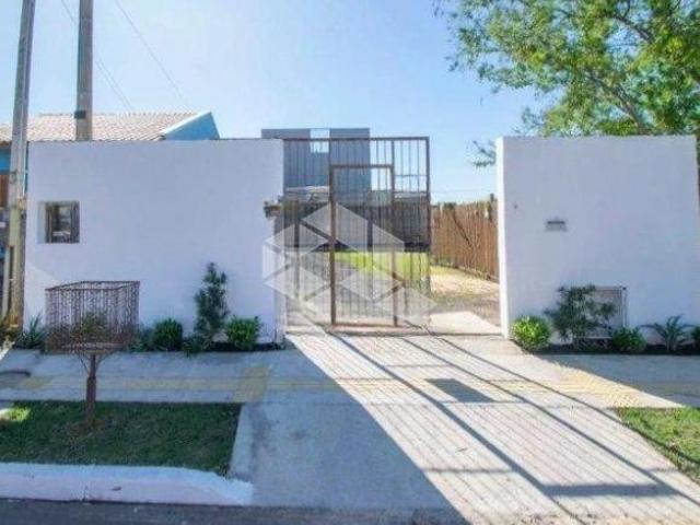 Casa térrea, 2 dormitórios, localizado em Rua Bombinhas, Bairro Brigadeira Canoas