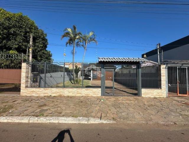 Casa térrea 2 dormitórios sendo 1 suíte, 146 m² construído, bairro Rio branco Canoas