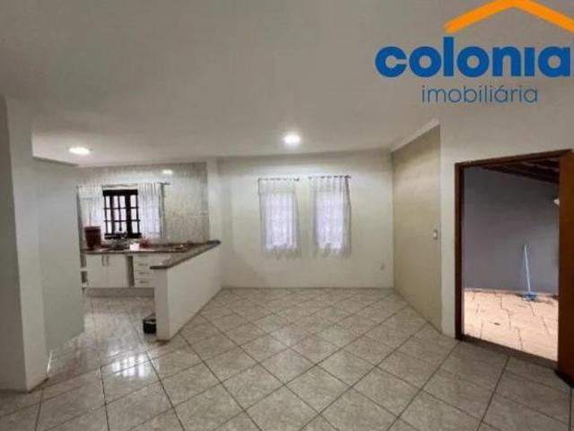 CASA TÉRREA 2 DORMITÓRIOS, SENDO 1 SUÍTE, 2 VAGAS COBERTAS, QUINTAL AMPLO COM DEPÓSITO.JARDIM ITÁLIA
