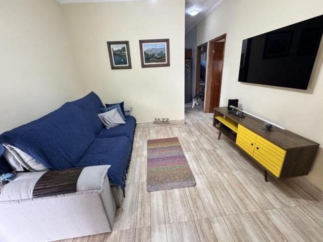 Casa terrea 2 dormitórios sendo 1 suíte com espaço gourmet, no bairro Tupi, em Praia Grande