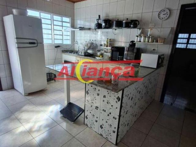 Casa Térrea 2 Dormitórios 2 vagas com Salão comercial na Frente Jd. Rosa de França 140m²