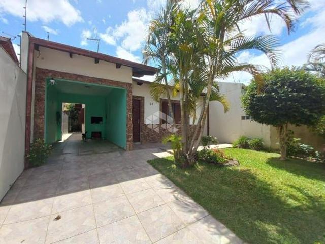 Casa térrea 3 dormitórios com churrasqueira e garagem bairro Igara Canoas/RS