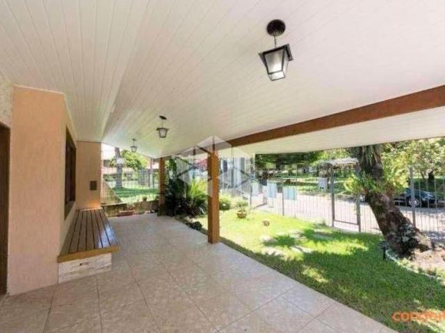 CASA TÉRREA, 3 DORMITÓRIOS, SUITE, 5 VAGAS E PISCINA EM IPANEMA