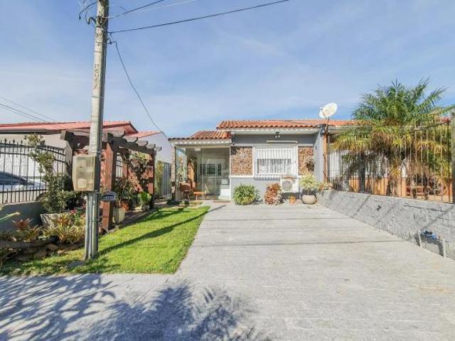 Casa térrea 3 dormitórios totalmente reformada área de churrasco coberta e entra