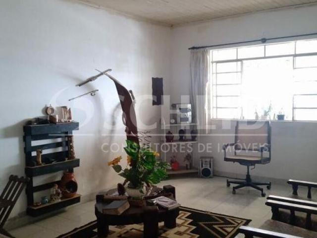 Casa Térrea a Venda 3 Dormitorios, 2 Salas, 1 Vaga e 200m² de Area Construida