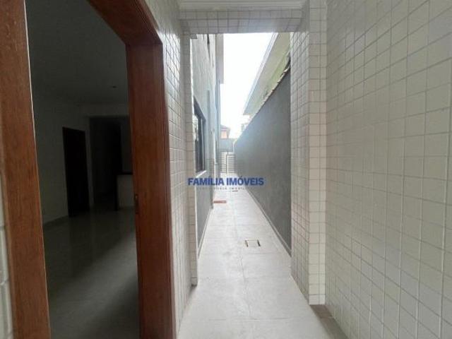 Casa térrea à venda 3 suítes 2 vagas churrasqueira Emabré Santos/SP