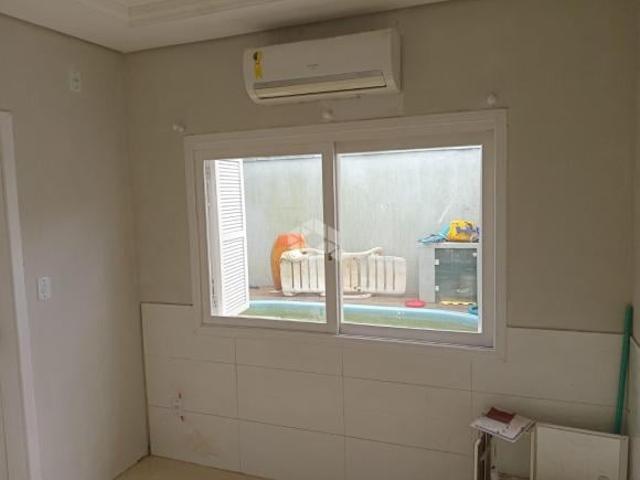 Casa terrea com 3 dormitorios e piscina no bairro Harmonia em Canoas/RS