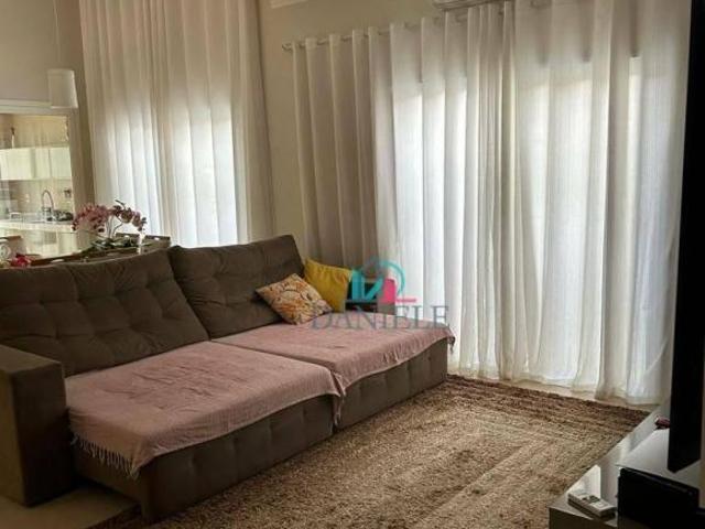 Casa térrea com 3 dormitórios suítes localizada no condomínio Acácias I