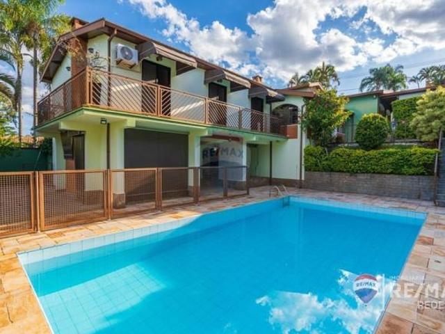 Casa Térrea,com 3 dorms, 1 suíte, piscina aquecida e edícula com 2 dorms, 1 suíte, em Vinhedo SP