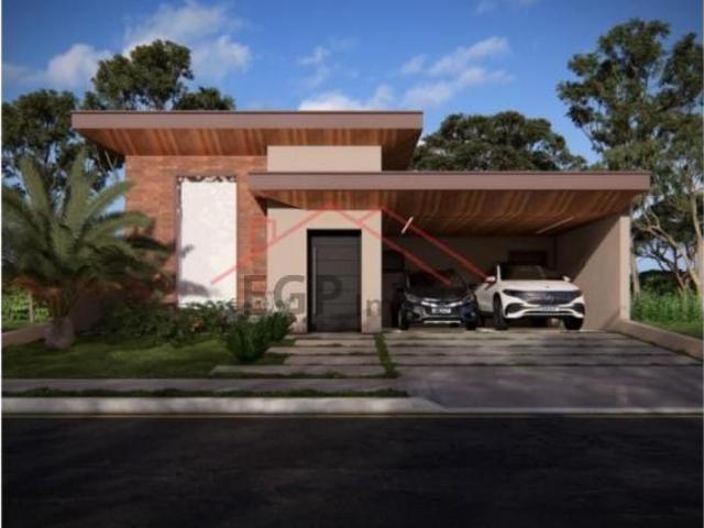 Casa térrea com 3 suítes, 2 salas, cozinha modulada, lavanderia, espaço gourmet, garagem para 2 carr