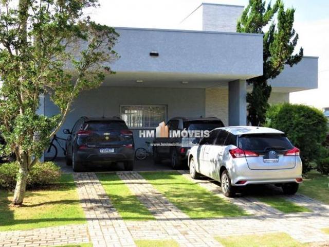 Casa Térrea com 3 suítes, 4 vagas, área gourmet completa, escritório, armários planejados, energia f