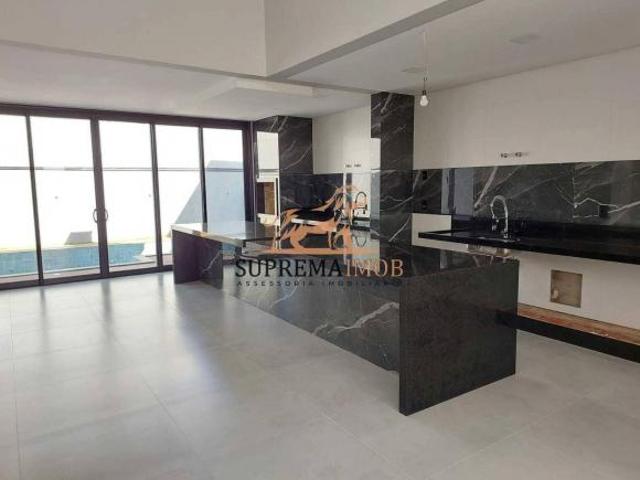 Casa térrea com 3 suítes à venda Condomínio Alphaville Nova Esplanada 4