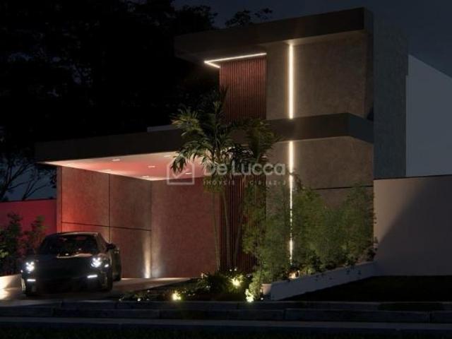 Casa térrea com 3 suítes, escritório, piscina e aquecimento solar – Residencial