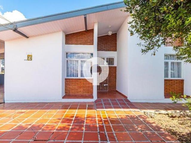 CASA TÉRREA COM 134M² NO UBERABA 3 QUARTOS 1 SUÍTE 3 VAGAS TERRENO DE 585M²