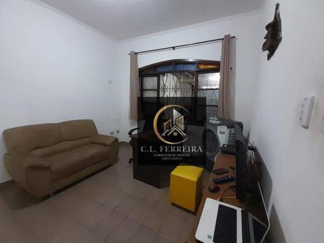 Casa térrea com 2 dormitórios e edícula à venda, 150 m² por R$ 799.000 Boqueirão Praia Grande/SP