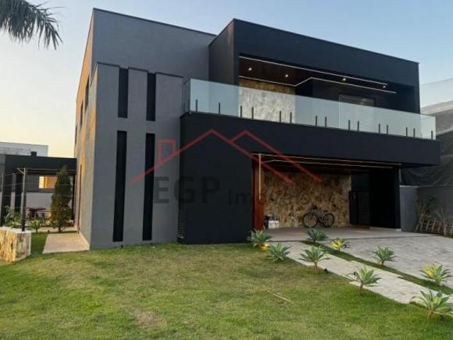 Casa térrea com 460 m² Condomínio Alphaville IV 05 suítes