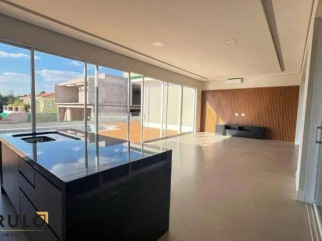 Casa térrea com 4 suítes, 400 m² venda por R$ 5.490.000 ou aluguel por R$ 30.300/mês Condomínio
