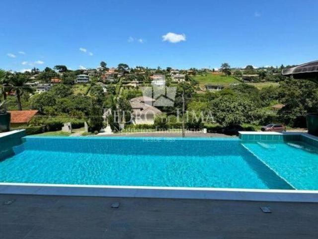 Casa Térrea com 4 suítes, 4 vagas e piscina no condomínio Jardim das Palmeiras Bragança Paulista SP