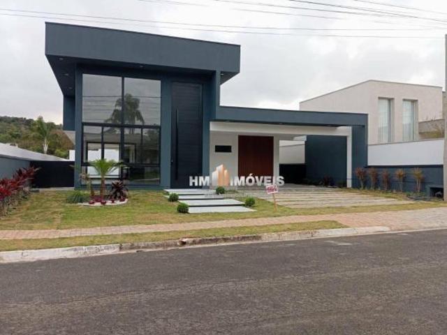 Casa térrea com 4 suítes, piscina, 6 banheiros, sauna, depósito, área gourmet, 320 m² na cidade de A
