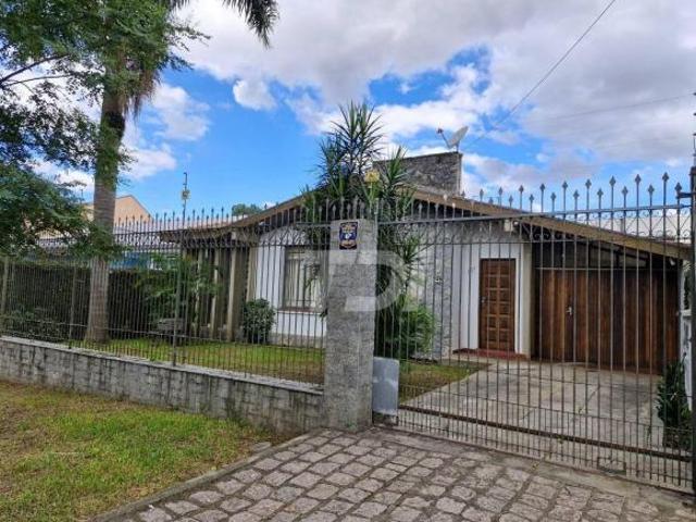 Casa térrea com 6 dormitórios à venda, 357 m² por R$ 1.460.000 Água Verde Curitiba/PR