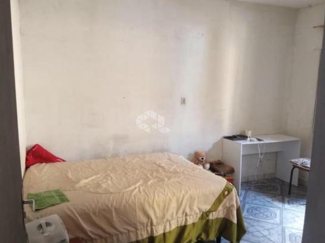 Casa térrea com edícula
