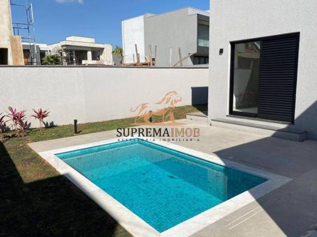 Casa térrea com piscina, 4 suítes Condomínio Alphaville Nova Esplanada 4