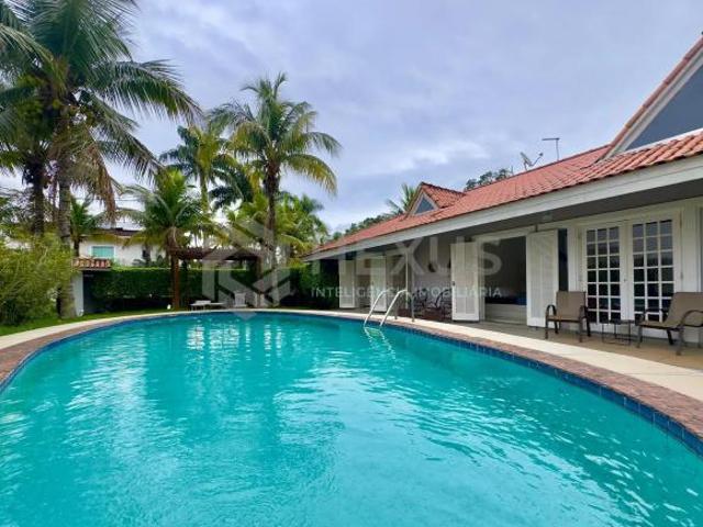Casa térrea com piscina e área gourmet no Jardim Pernambuco I, Guarujá