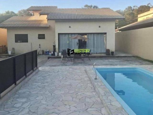 Casa térrea com piscina em rua tranquila e linda vista do Morro do Saci!