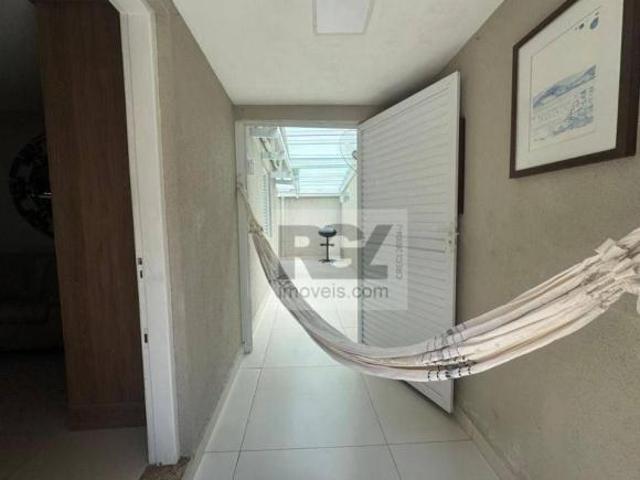 CASA TÉRREA COM QUINTAL REFORMADA, 80 m² por R$ 845.000 Ponta da Praia Santos/SP