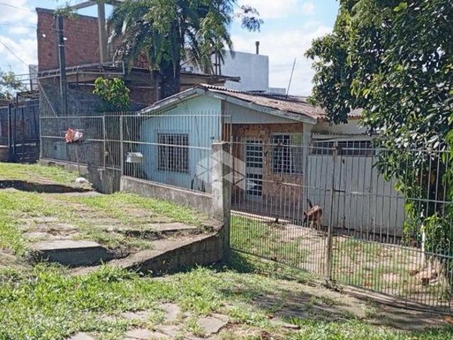 Casa térrea com terreno de 280m² no bairro Vila Jardim Porto Alegre