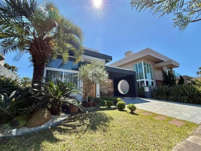 Casa térrea composta de 4 suítes/quartos, mobiliada em condominio fechado em Xangri la