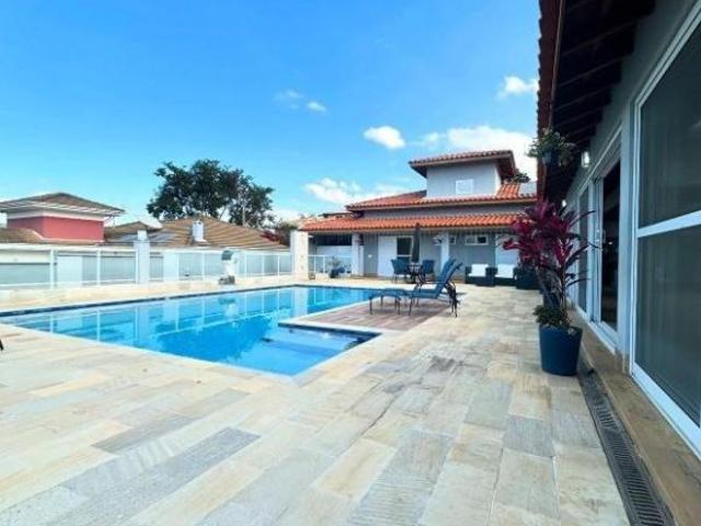 Casa térrea de 435m² à venda no Condomínio Vivendas do Japi Jundiaí/SP: 3 suítes, área gourmet, pi