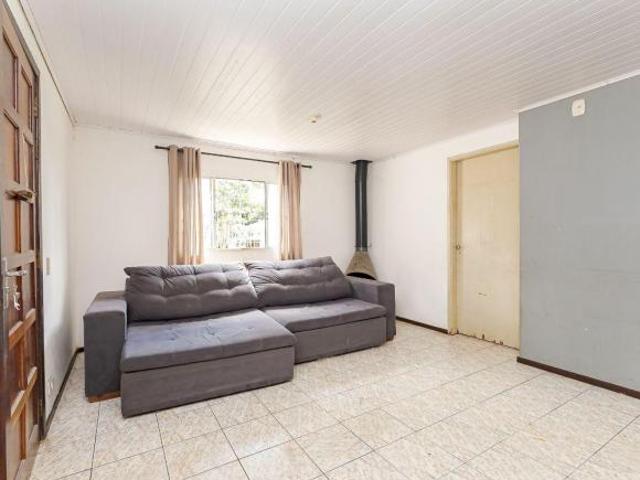 Casa para retrofit, térrea, de 147 m² com quintal à venda no bairro Uberaba Curitiba PR