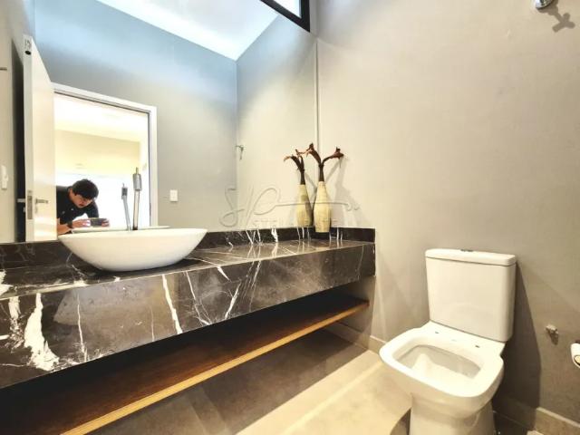 Casa térrea de 272m² com 03 suítes para locação e venda em condomínio Alphaville Ribeirão Preto