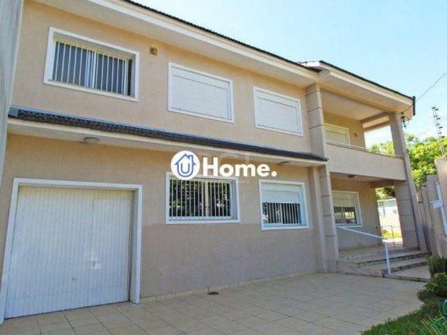 Casa térrea de 2 dormitórios e 3 vagas de garagem na Vila Ipiranga em Porto Aleg