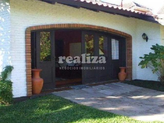 CASA TÉRREA E DE ESQUINA