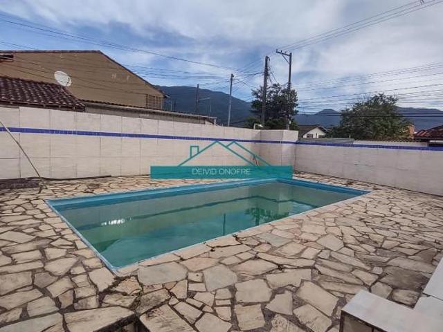 Casa térrea em condomínio a venda no Bairro Perequê Mirim Caraguatatuba