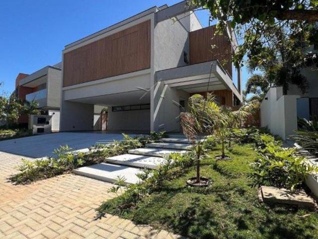 CASA TERREA EM CONDOMINIO COM 4 SUITES SENDO 3 CLOSET E 1 MASTER  ALPHAVILLE NOVA ESPLANADA 3  VOTO
