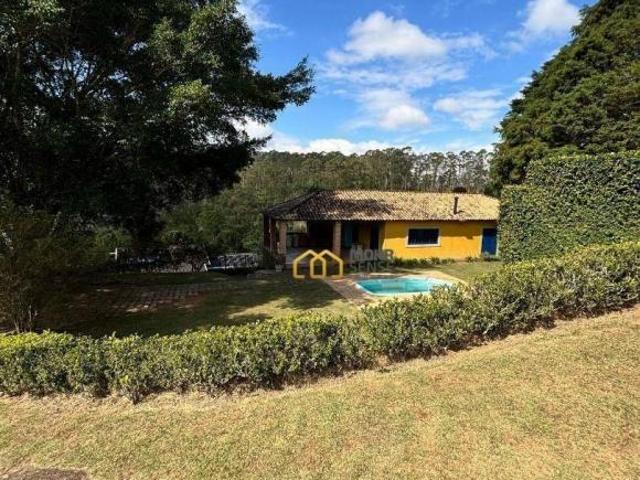 Casa Térrea em Condomínio Fechado | 4 Suítes, Piscina e Terreno de 1.300 m²