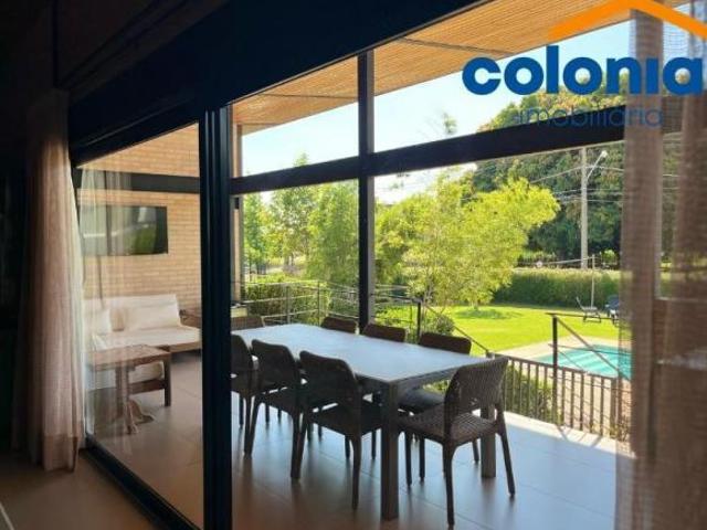 CASA TÉRREA EM CONDOMÍNIO FECHADO COM 3 DORMITÓRIOS, SENDO 2 SUÍTES, COM AR, PISCINA, ÁREA GOURMET C