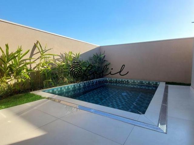 Casa térrea localizada no Condomínio Jardins Mirante, com 3 suítes e 170m² Ribeirão Preto/SP