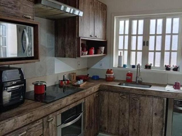 CASA TÉRREA MISTA A VENDA NO CONDOMINIO ARUÃ