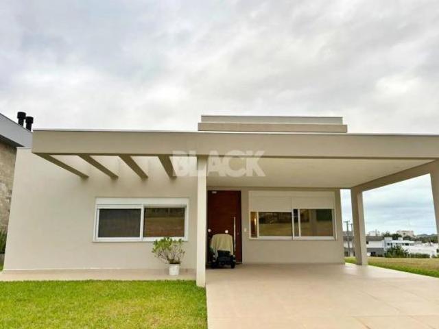 Casa térrea mobiliada no Condomínio Reserva das Águas em Torres RS