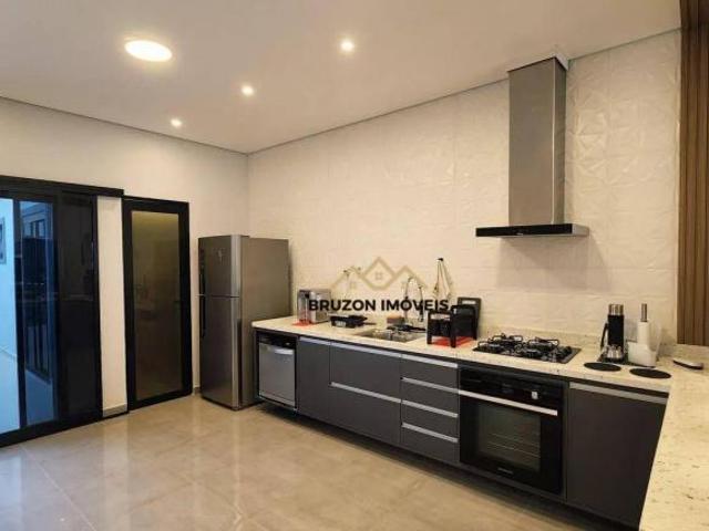 CASA TÉRREA MODERNA À VENDA 3 QUARTOS 1 SUÍTE A.T. 300M², A.C. 188M² R$ 1.840.000,00 CONDO